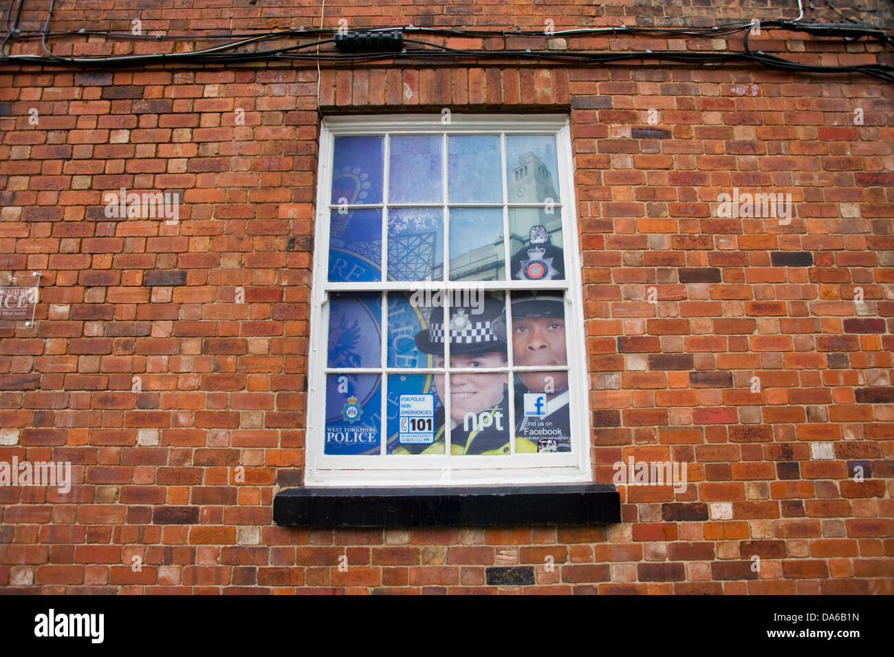 Poster in sash window of Police Station near Leeds Uni Leeds West ...
