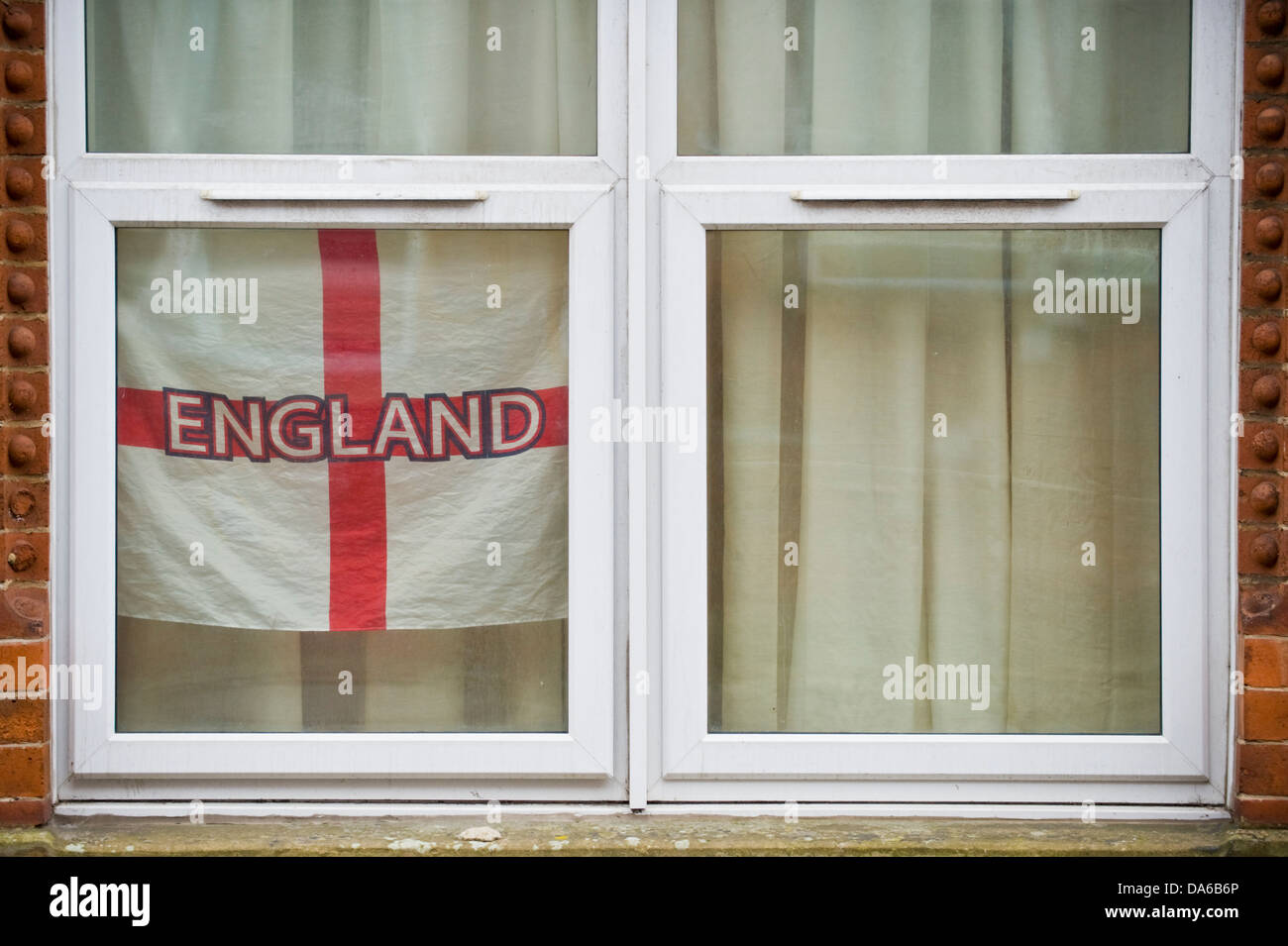 England flag hanging in window of house in Leeds West Yorkshire England ...