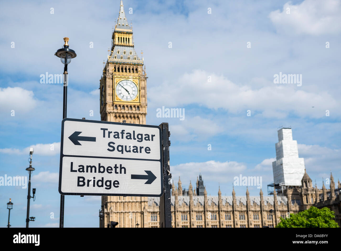 Trafalgar Square and Lambeth Bridge sign in front of Big Ben in London ...