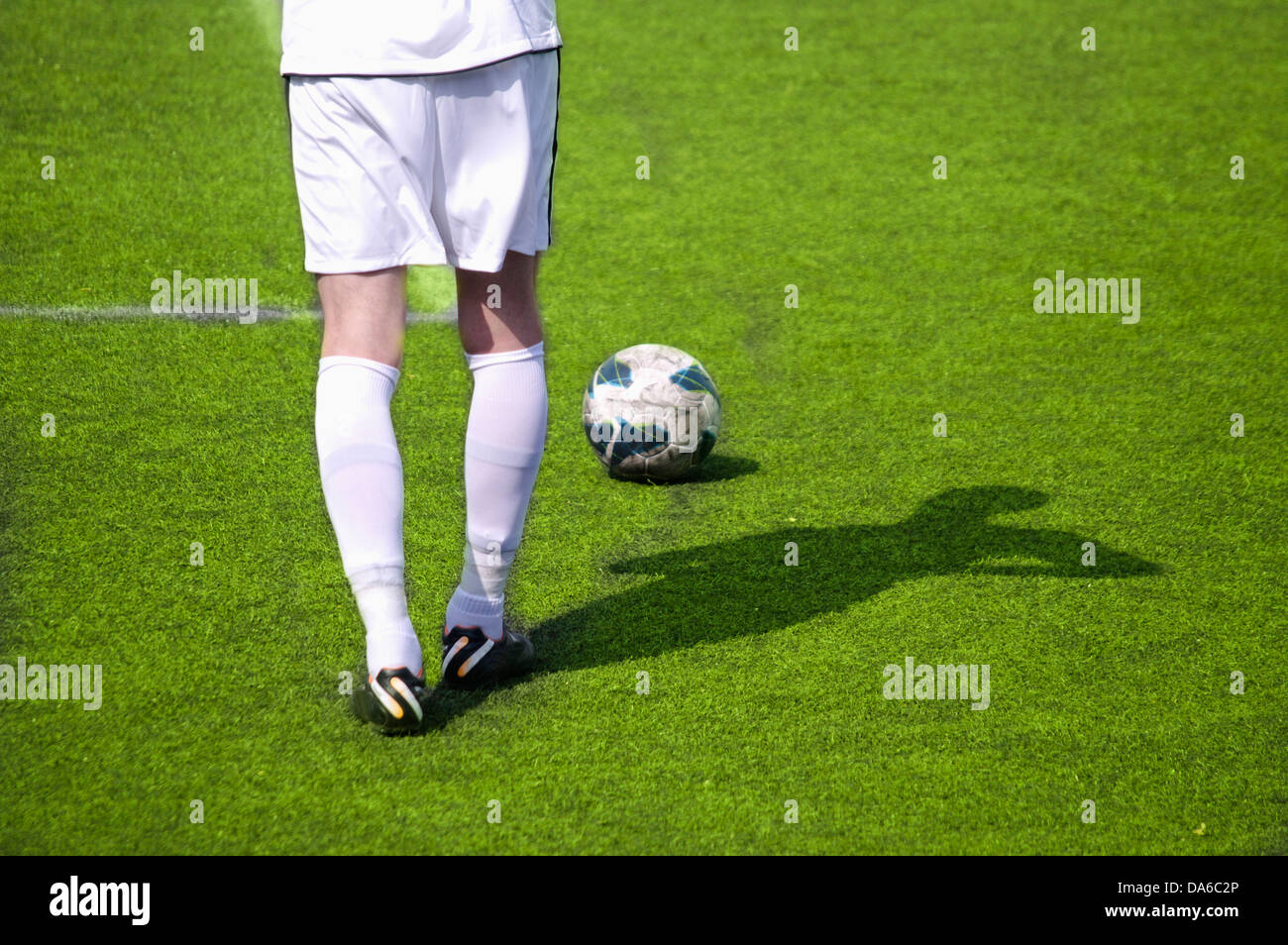 Soccer football player standing feet hi-res stock photography and ...