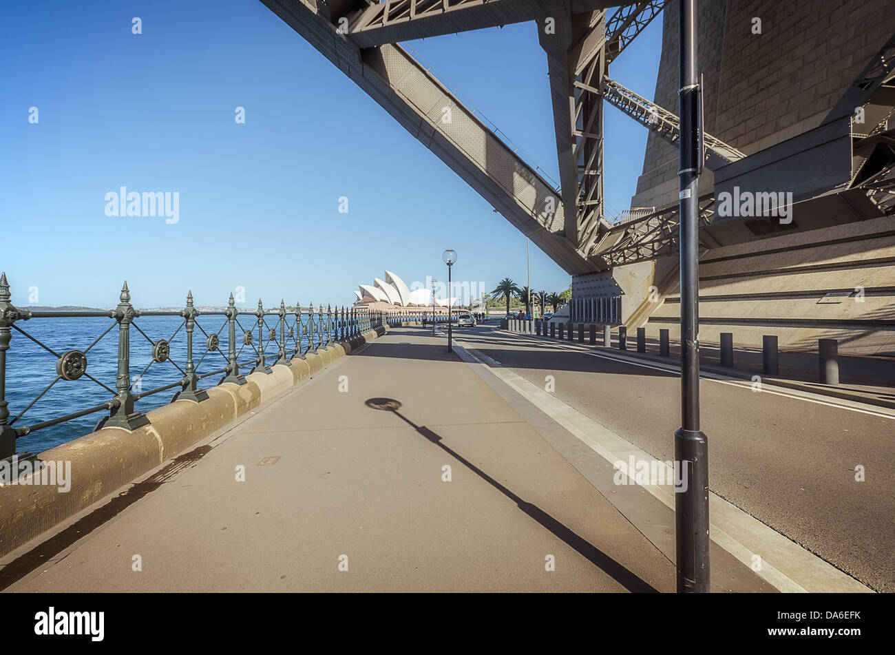 The iconic Sydney Opera House viewed from underneath the Harbour Bridge ...