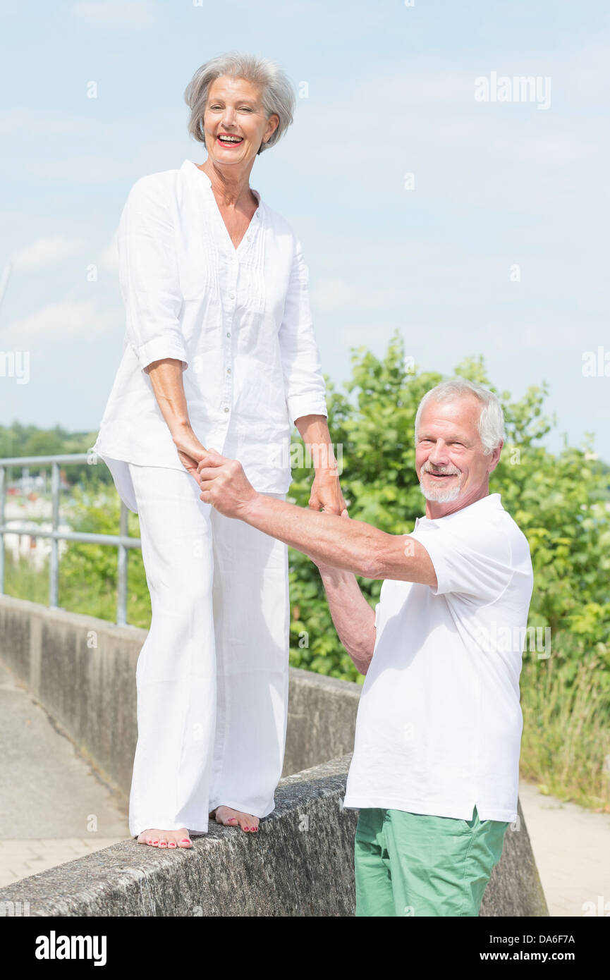 Smiling and actice senior couple Stock Photo - Alamy