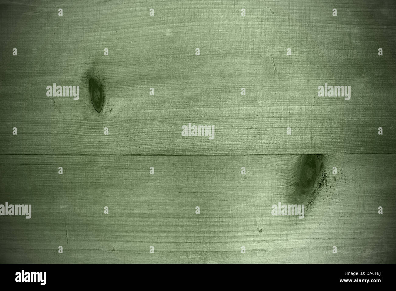 Distressed wooden boards with vignette and green tint Stock Photo - Alamy