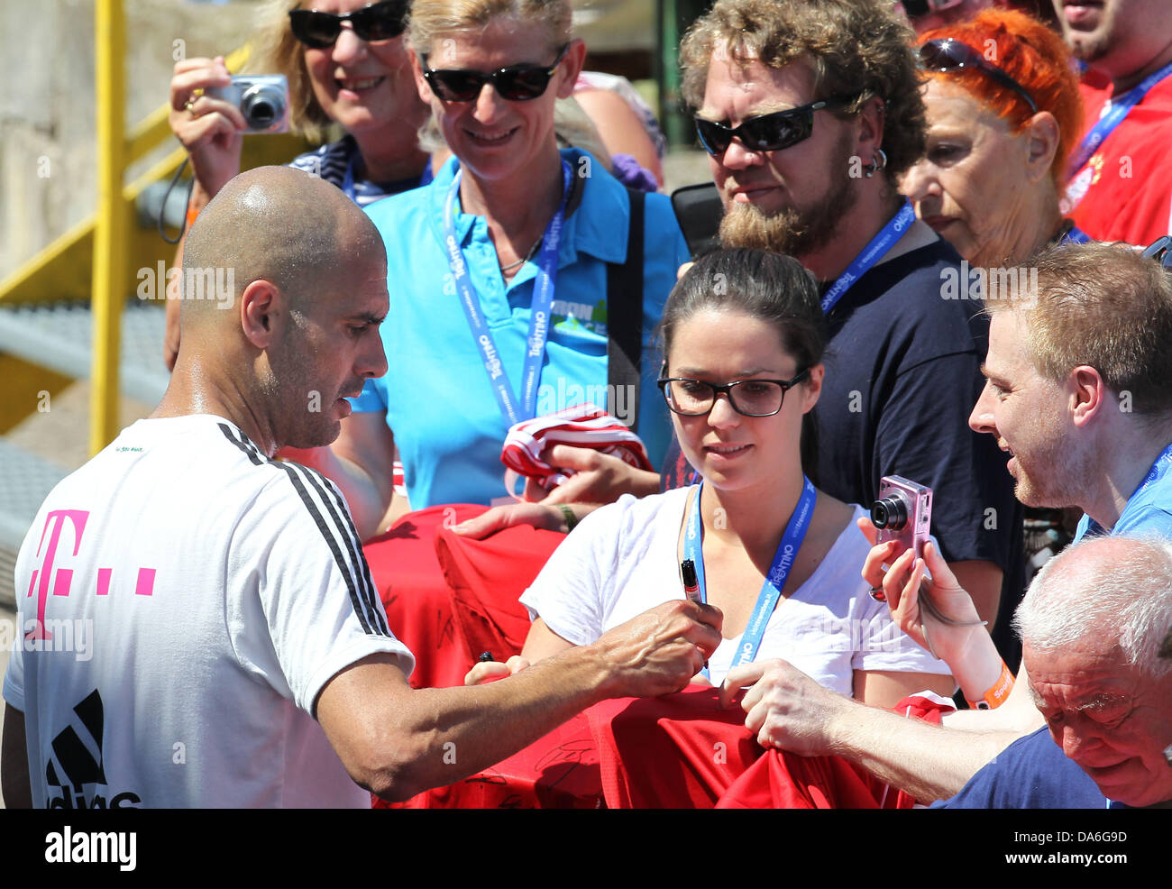 Arco, Italy. 05th July, 2013. Munich's head coach Pep Guardiola signs ...