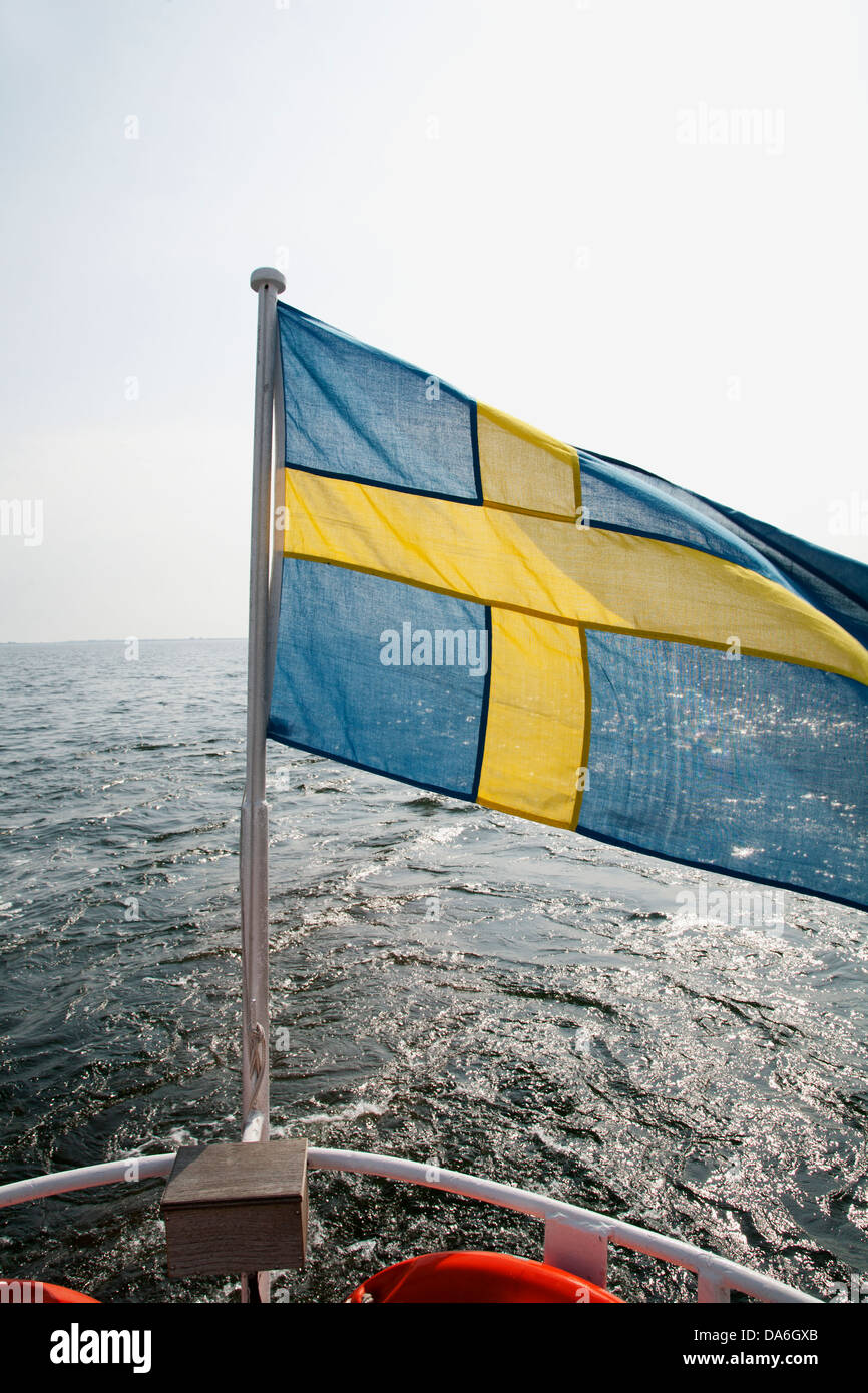 Swedish flag on boat Stock Photo - Alamy