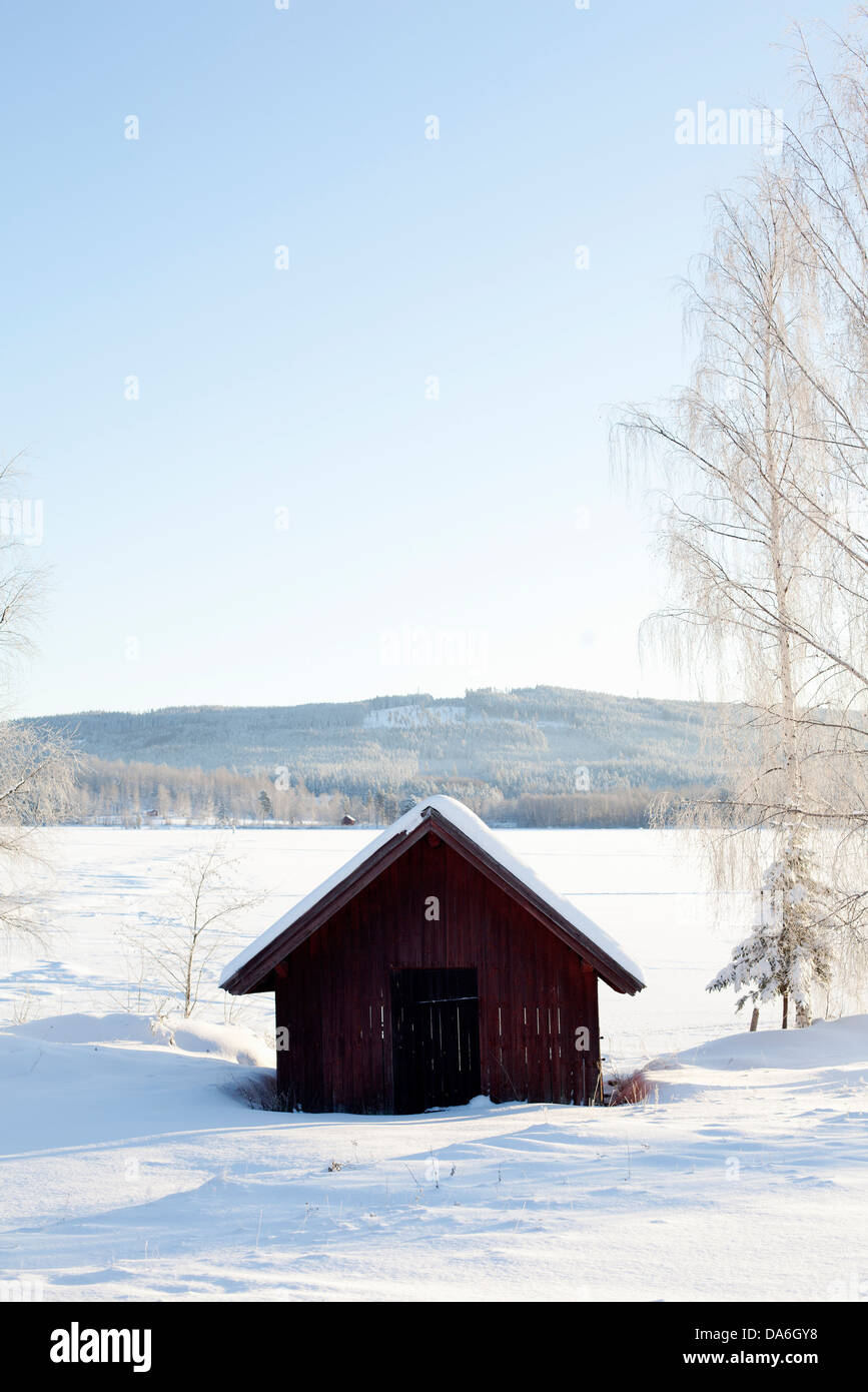 Hut and tree in winter hi-res stock photography and images - Alamy