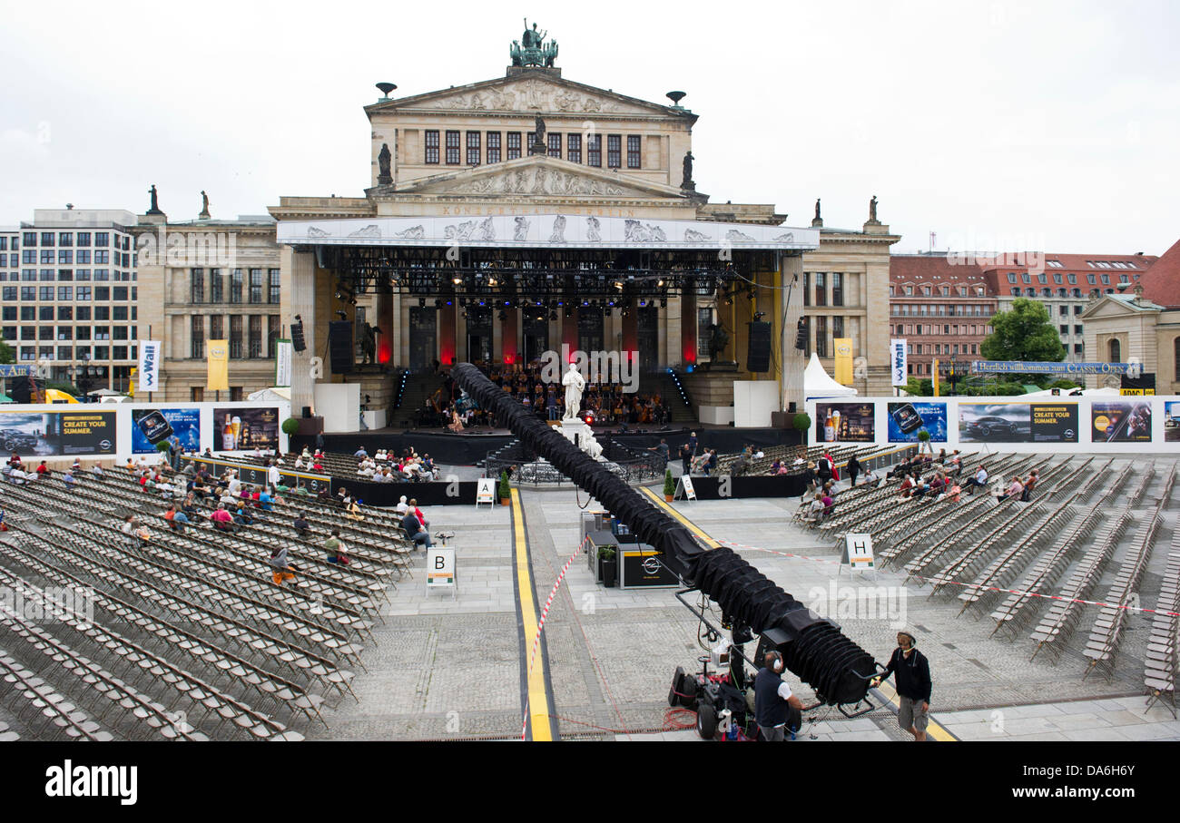People sit at the stage during the Classic Open Air at Gendarmenmarkt ...