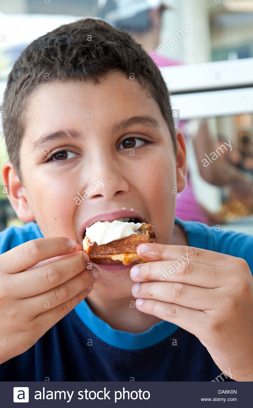 Boy Holding Sweets High Resolution Stock Photography and Images - Alamy