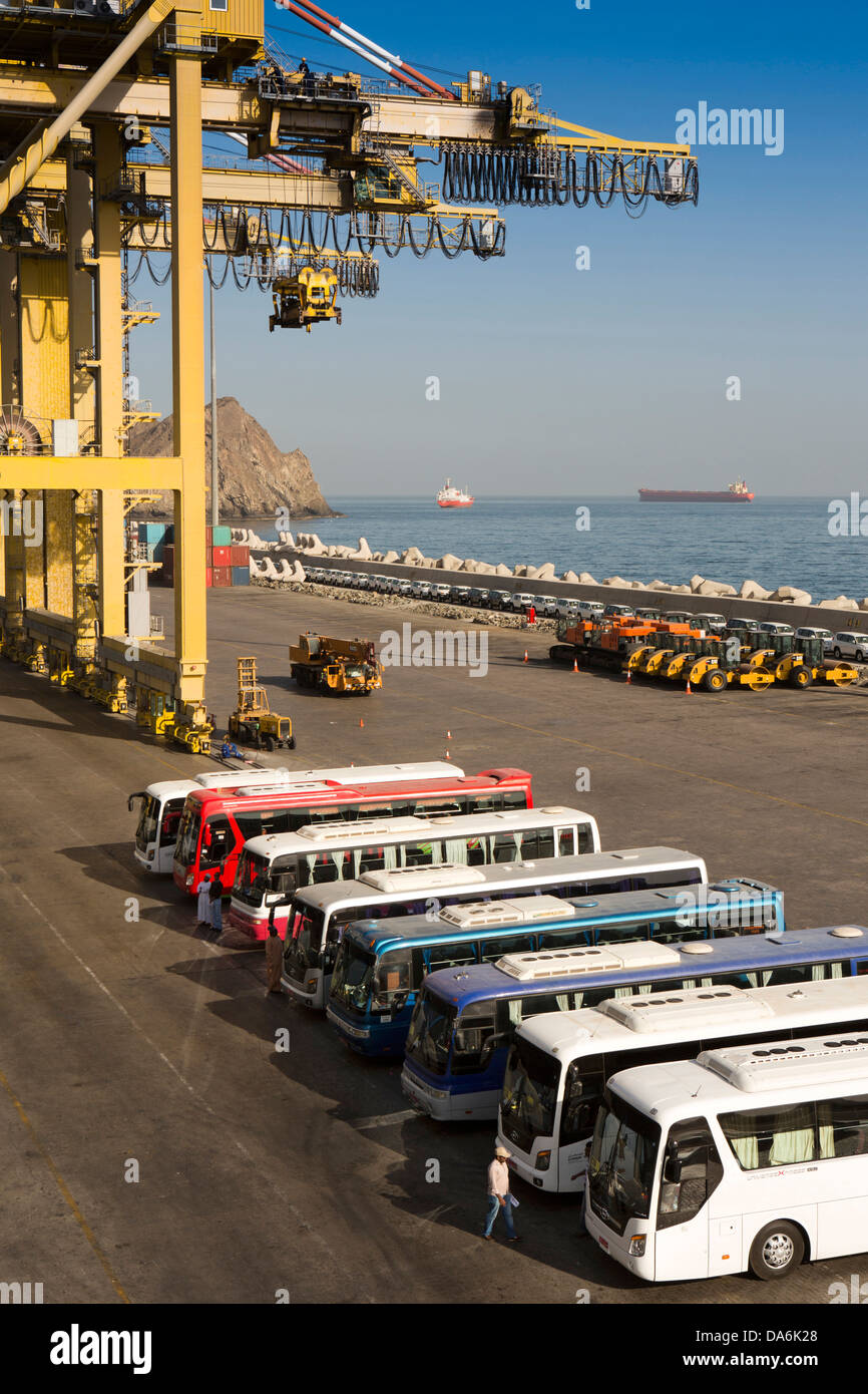 Oman, Muscat, Container port, cruise ship excursion coaches on quayside ...
