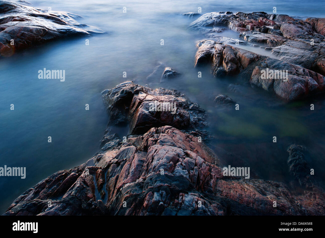 Rocks in sea Stock Photo - Alamy
