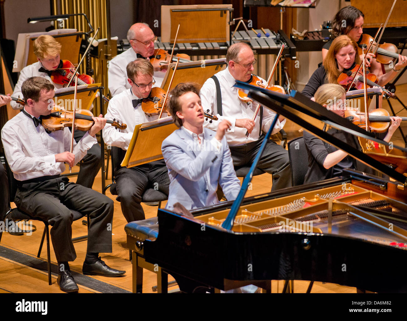 London, UK. 4th July 2013. Oliver Poole, pianist, performing "Gershwins ...