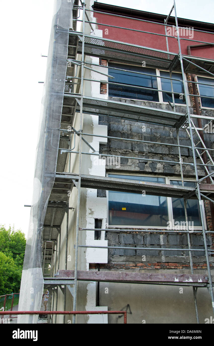 Photo of building being insolated with styrofoam Stock Photo - Alamy