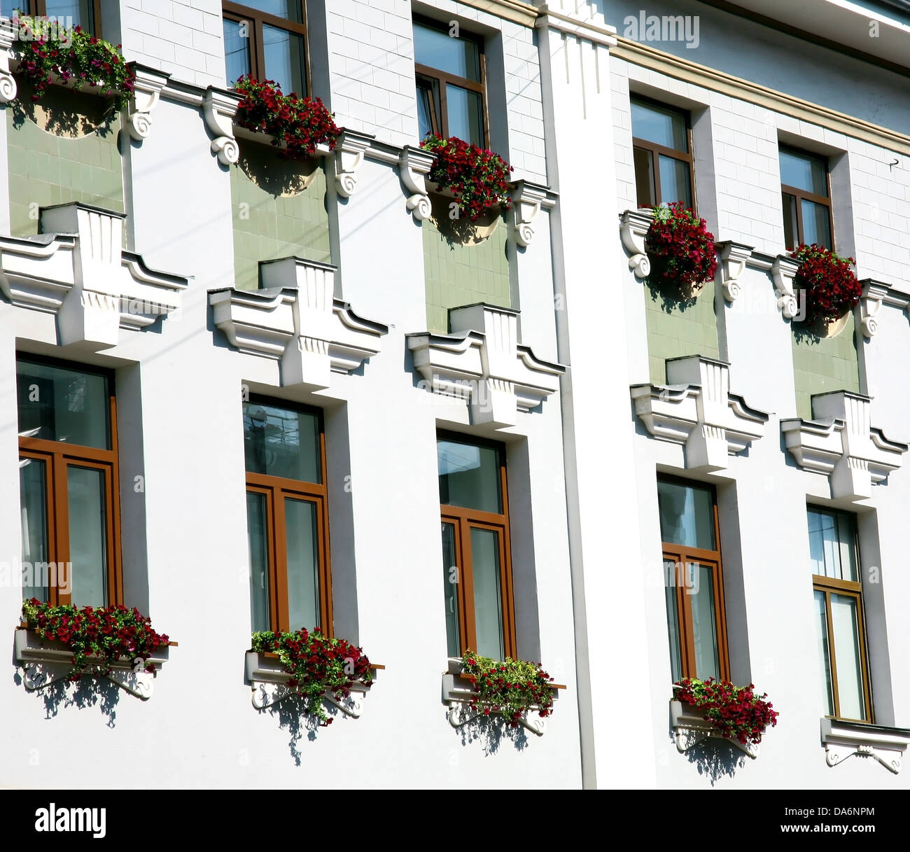 Windows and flower boxes Stock Photo - Alamy