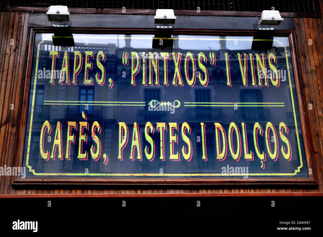 Barcelona, Catalonia, Spain. Cafe sign "tapas, wines, coffee, cakes ...