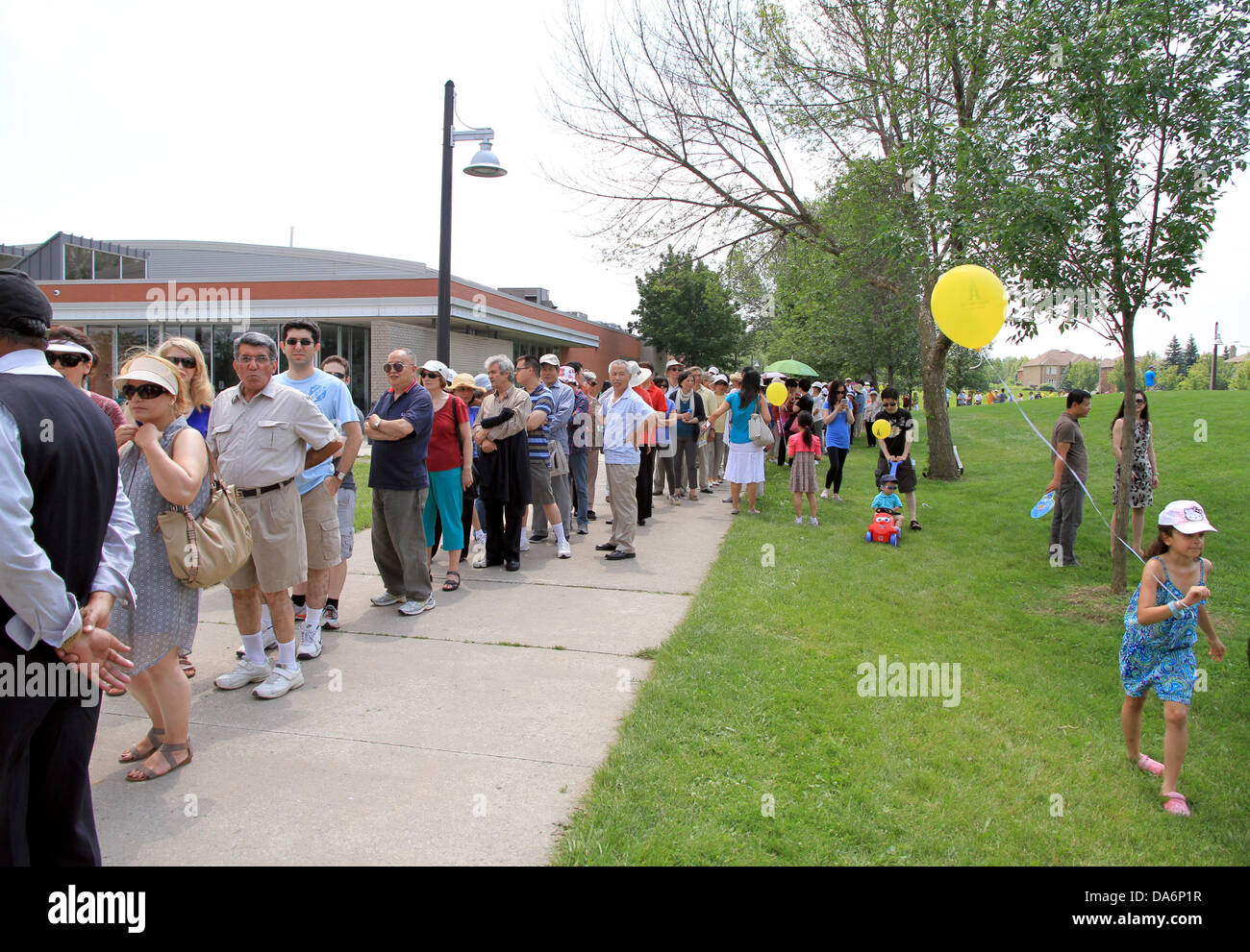 People lining up in a park on June 23, 2013 in Toronto, Canada Stock ...