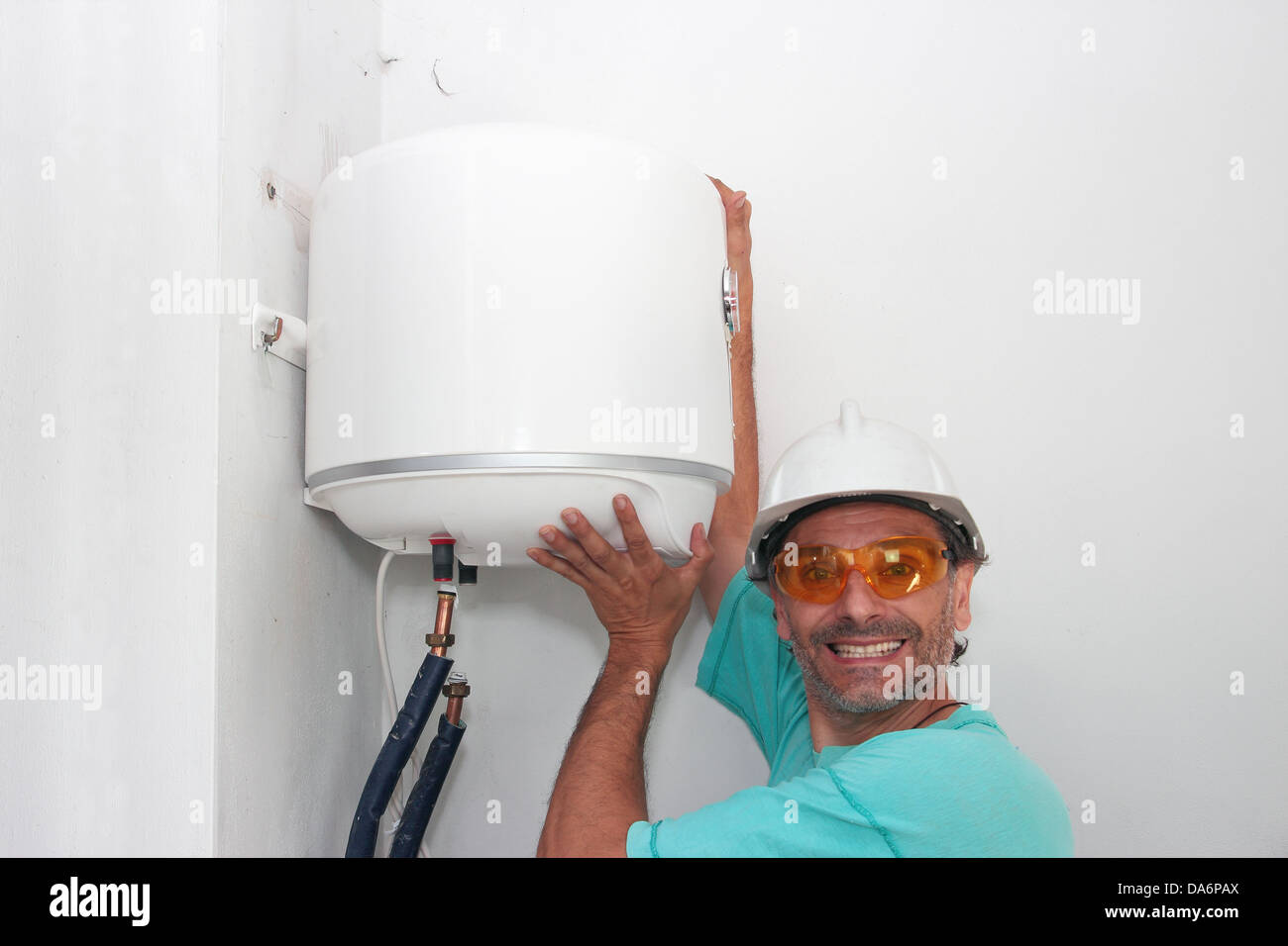 Happy plumber hi-res stock photography and images - Alamy