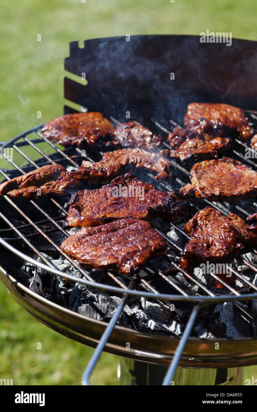 Barbecue grill whit meat hi-res stock photography and images - Alamy