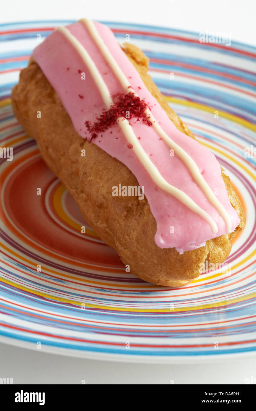 Golden choux pastries filled with a raspberry and blackcurrant mousse ...