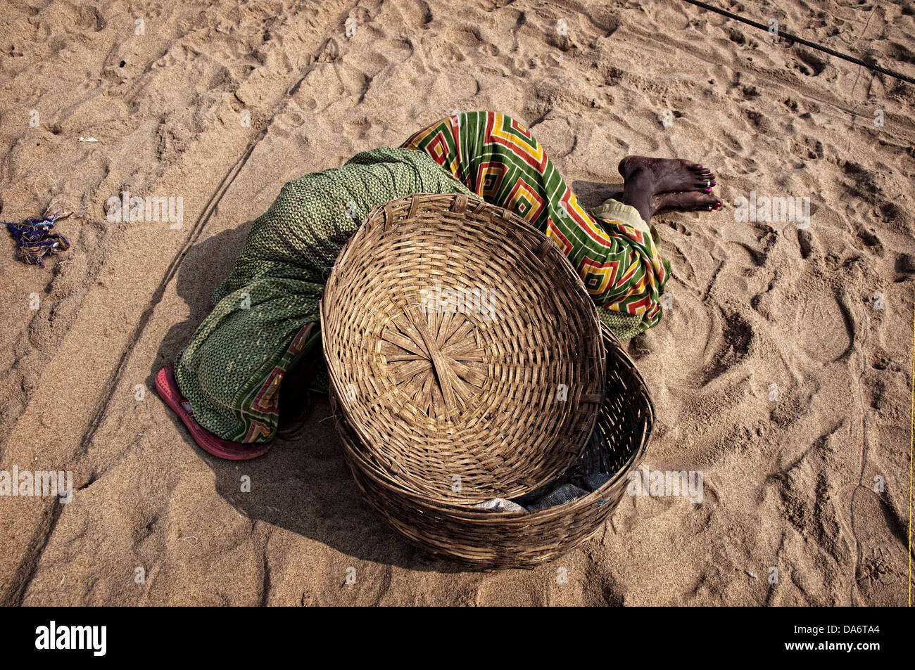 Woman sleeping beach puri hi-res stock photography and images - Alamy