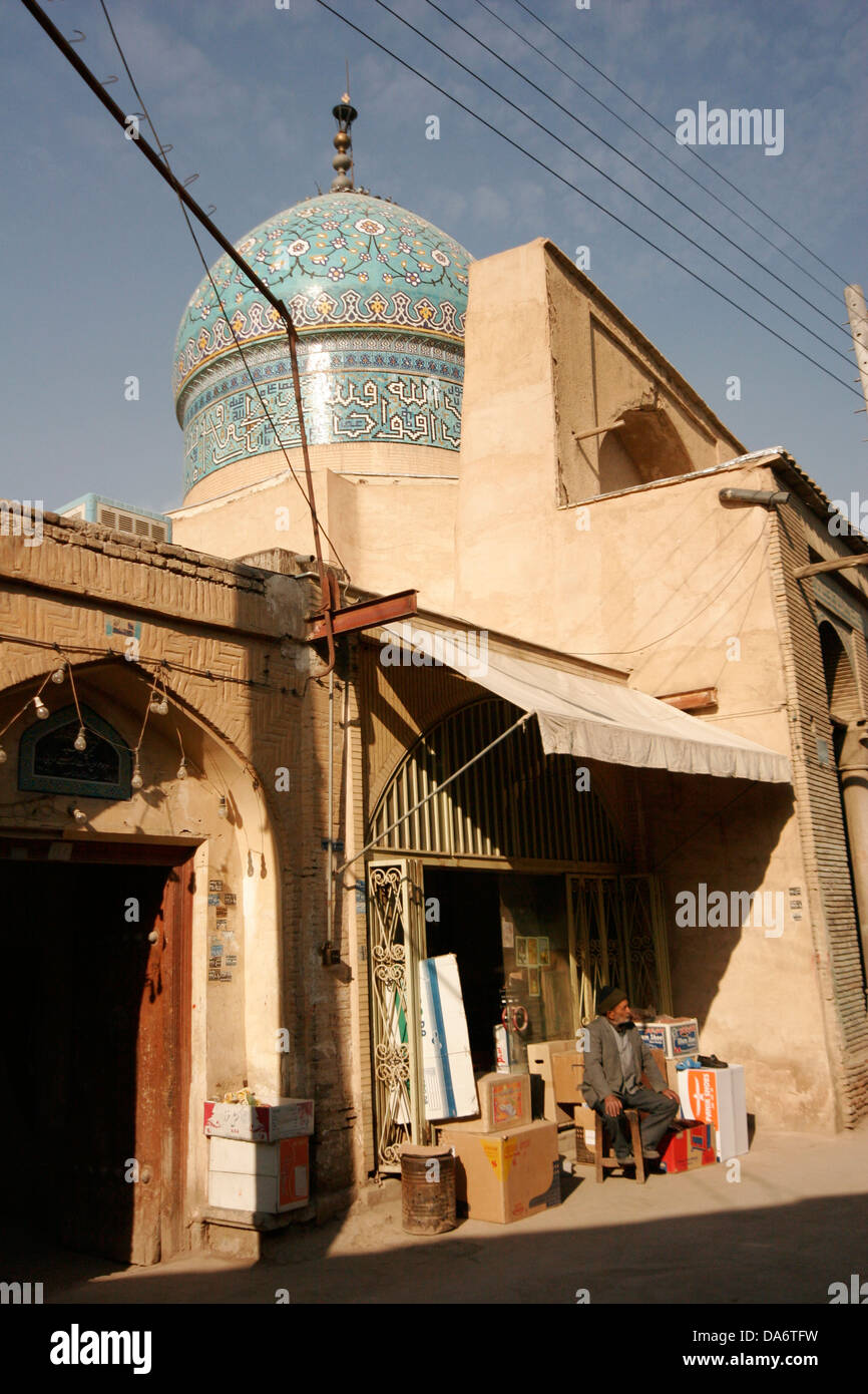 Little mosque and old man sitting near his shop in Esfahan, Central ...