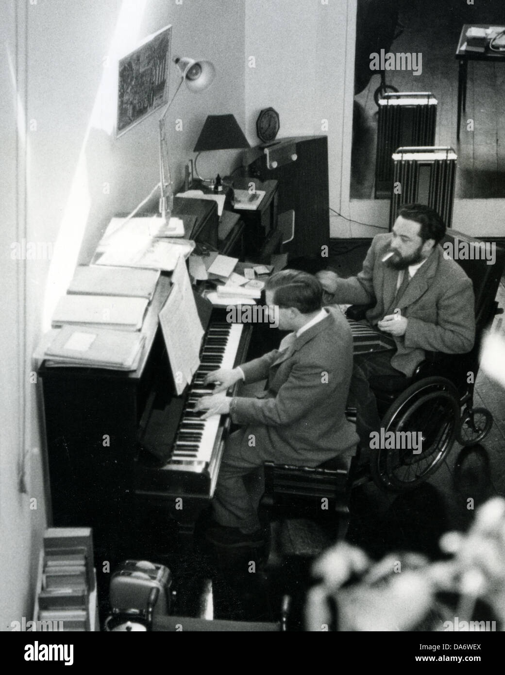 MICHAEL FLANDERS (1922-1975) English humorist at right in 1964 with ...