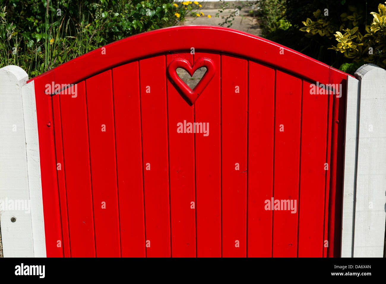 Heart shaped red front gate, England, UK Stock Photo - Alamy