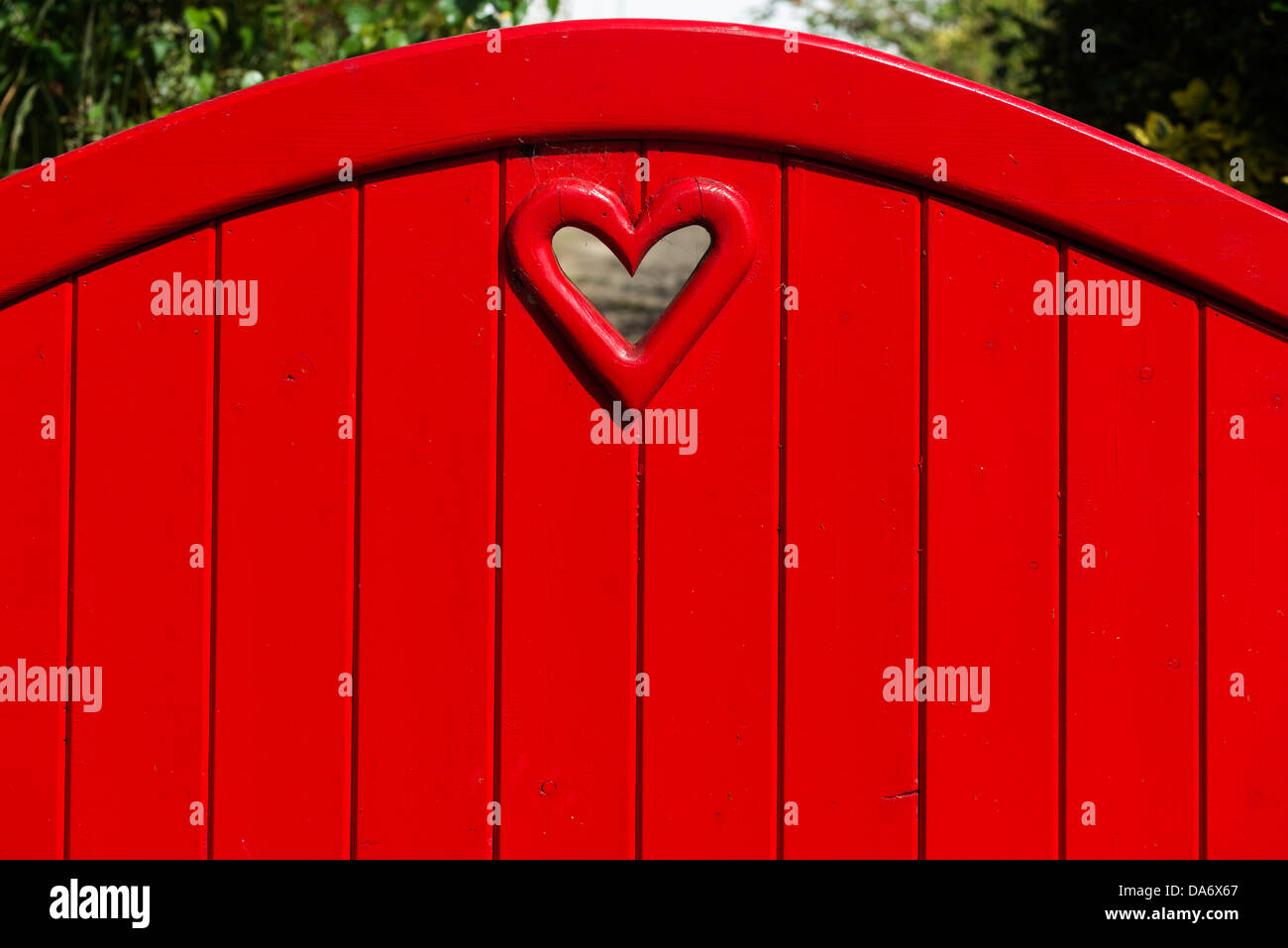 Heart shaped red front gate, England, UK Stock Photo - Alamy