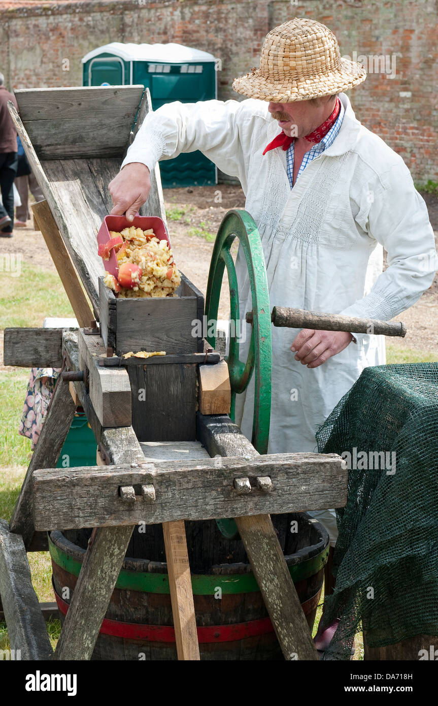 Man making cider the old fashioned way, Blickling Hall fair, Norfolk ...