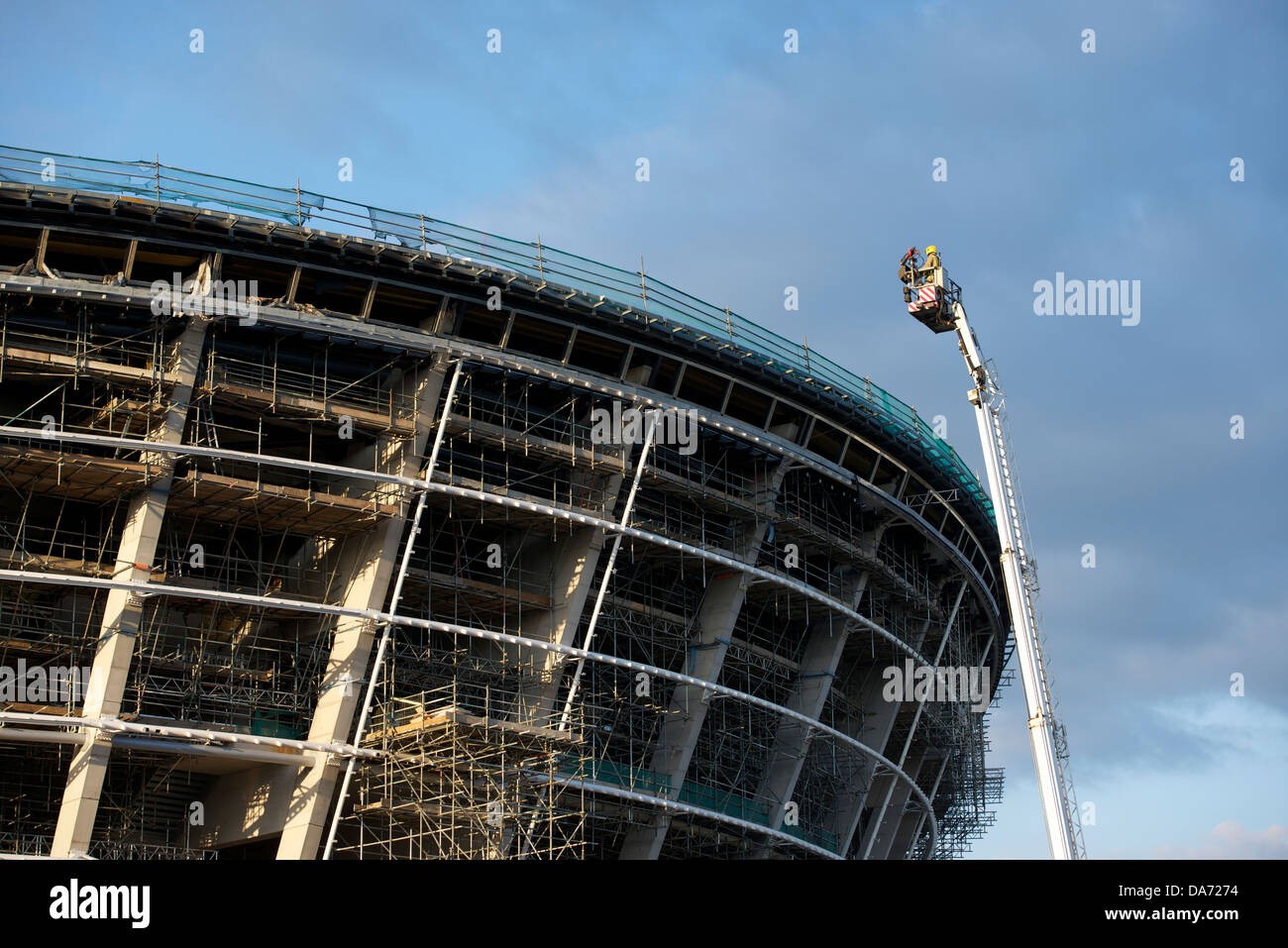 Firefighter keeps watch following a roof fire in the Hydro Arena ...