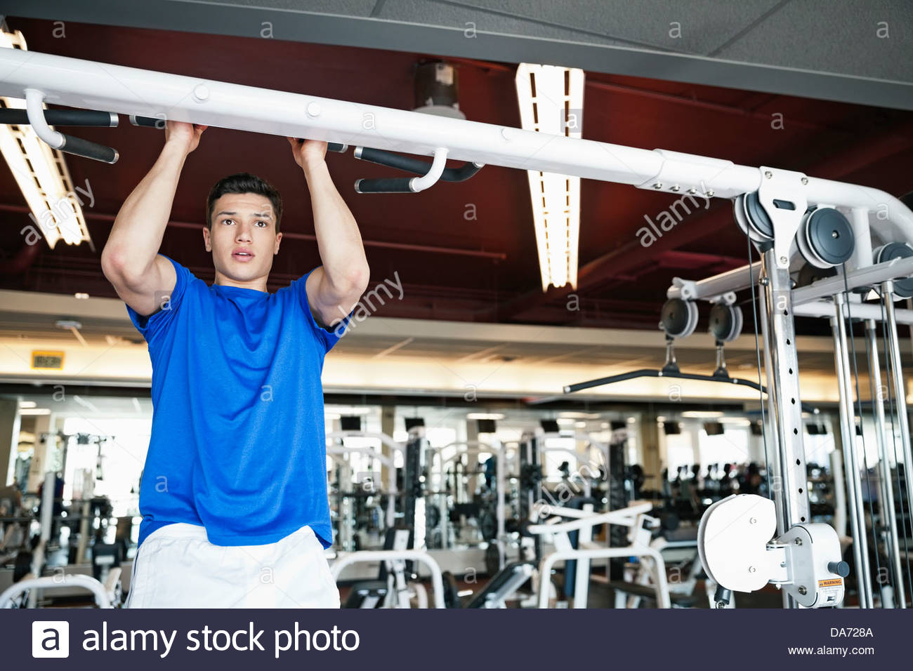 Three men doing pull ups hi-res stock photography and images - Alamy