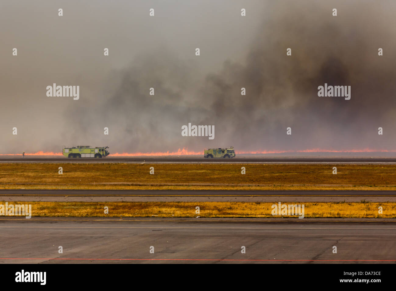 Fire trucks speed along runway as closes San Salvador International ...