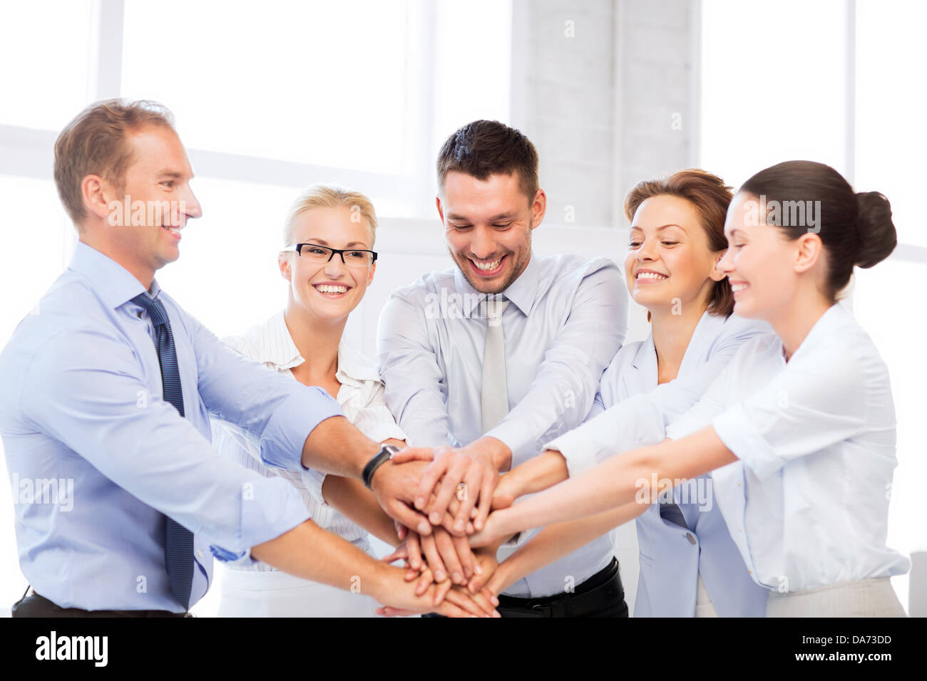 business team celebrating victory in office Stock Photo - Alamy