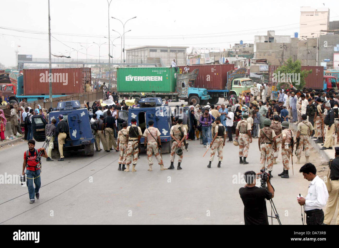 Residents of Lyari are protesting against clashes between two armed ...
