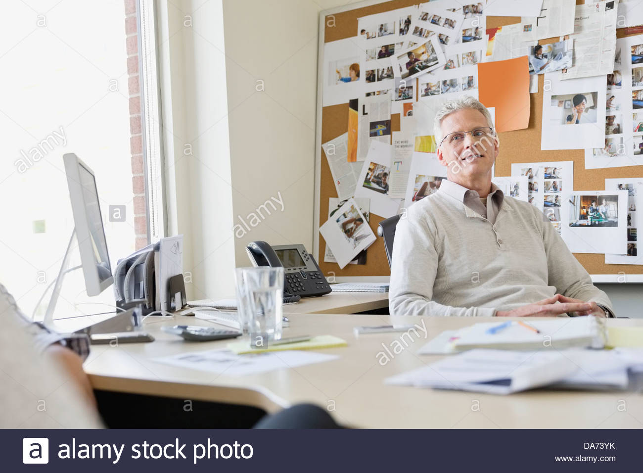Office worker sitting desk hi-res stock photography and images - Alamy