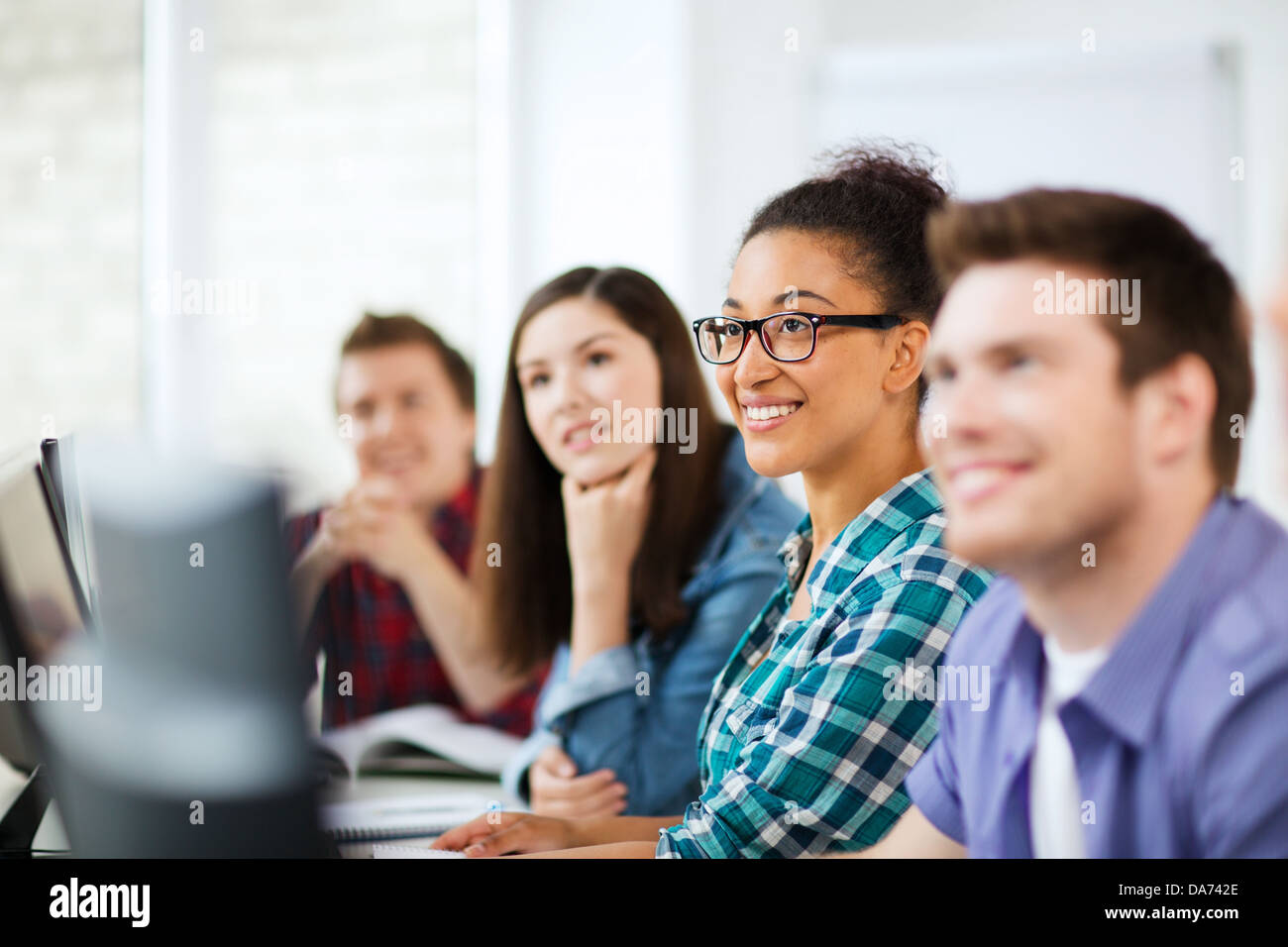 students with computers studying at school Stock Photo - Alamy