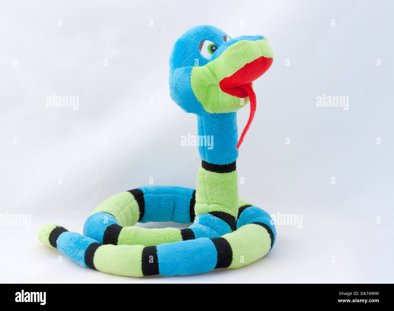 soft toy snake closeup against white background Stock Photo - Alamy