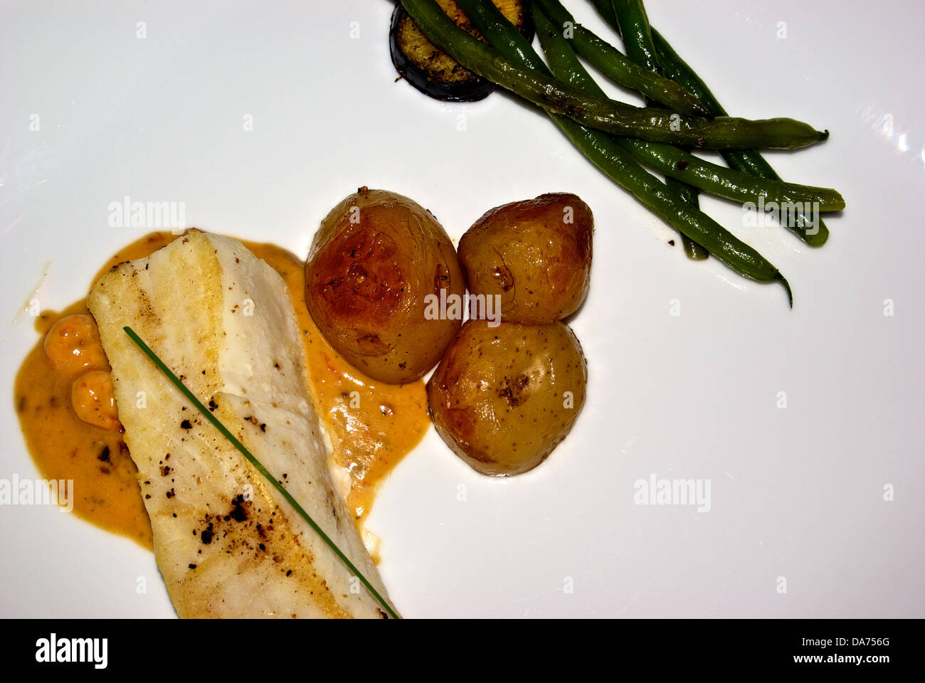 Pan seared boneless fillet halibut shrimp sauce roasted baby new ...