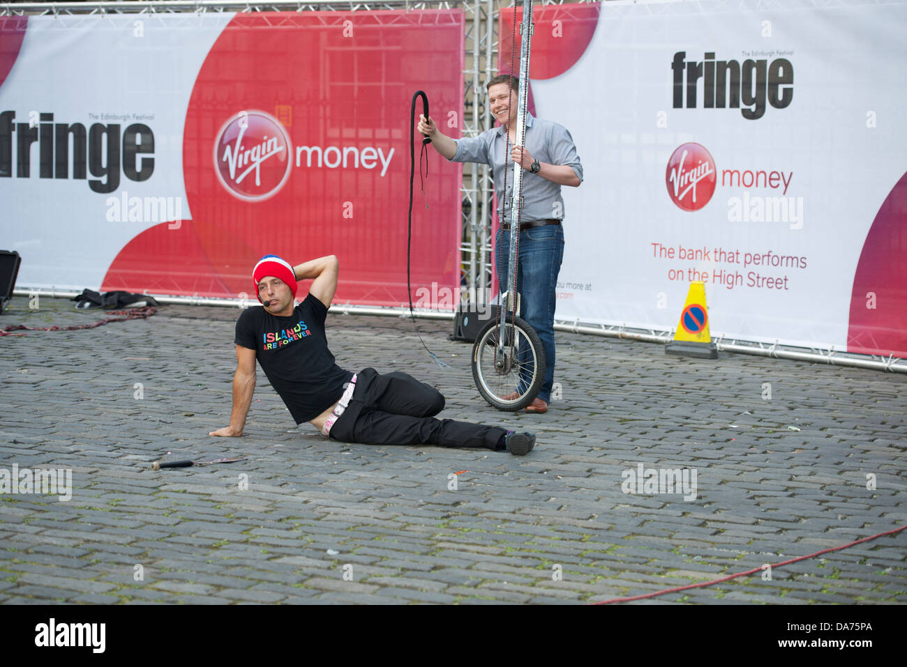 Performer poses provocatively during an Edinburgh Festival Fringe ...