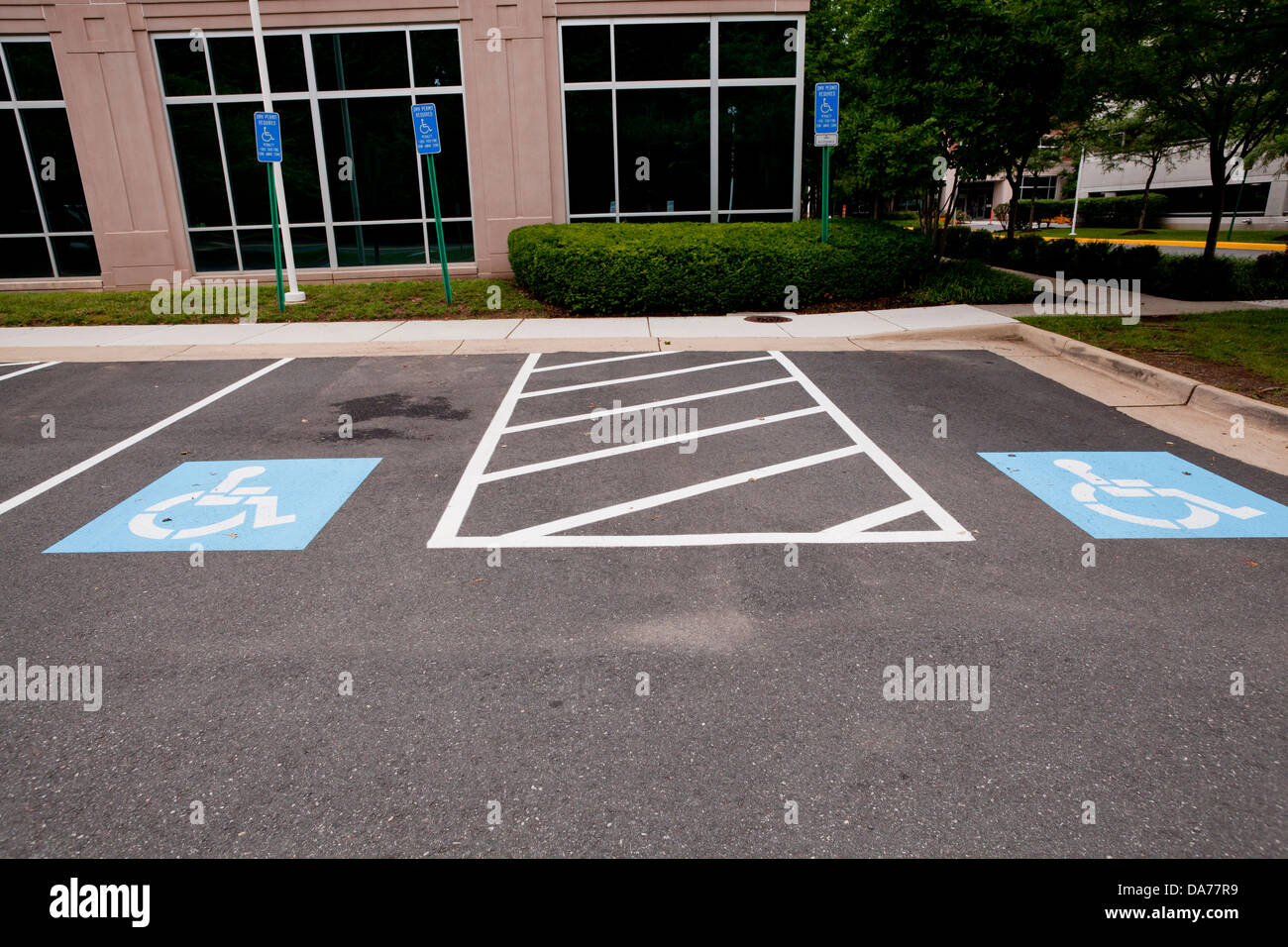 Disabled parking spaces Stock Photo - Alamy