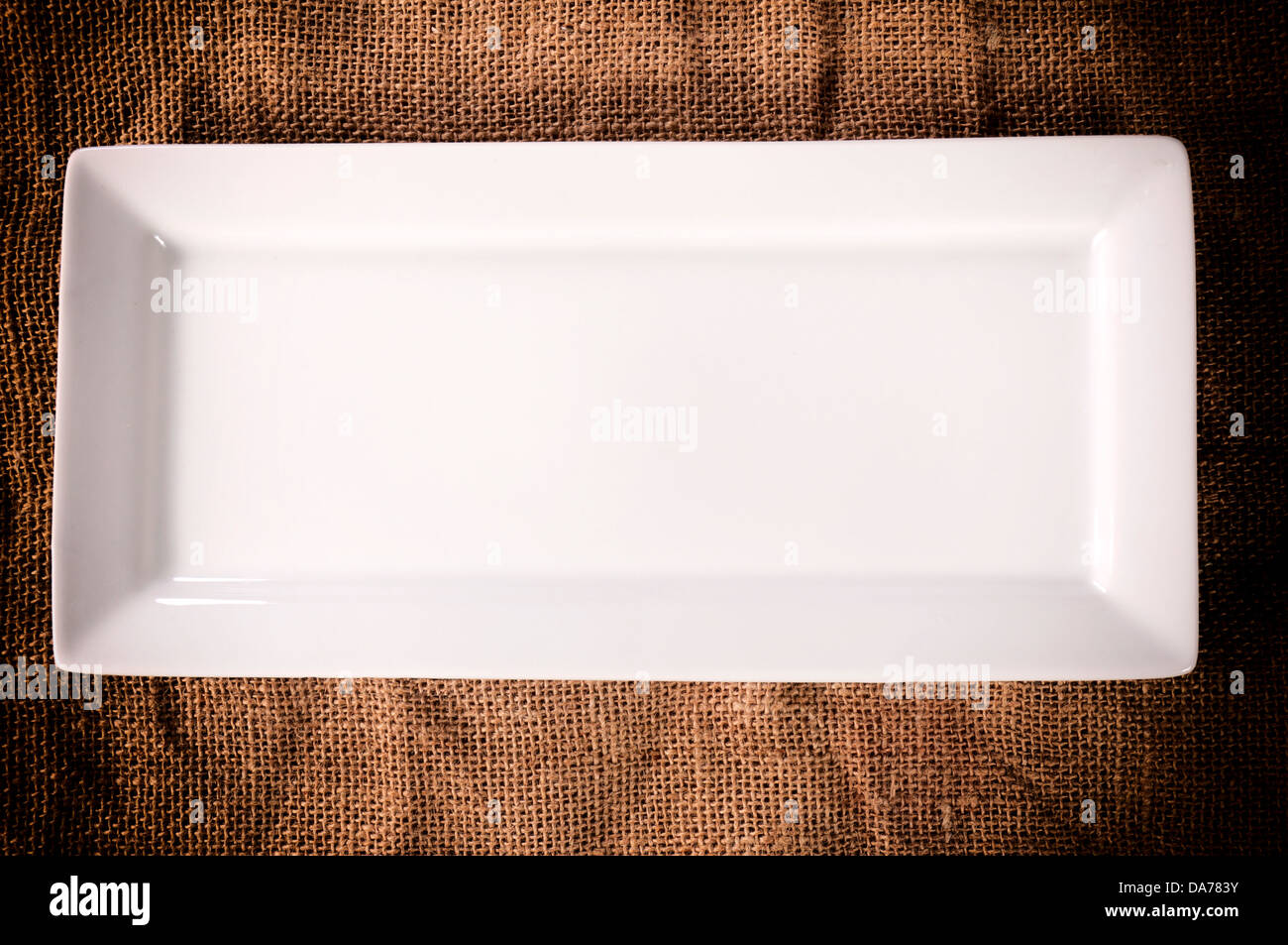 Empty white plate on the abstract background from above Stock Photo - Alamy
