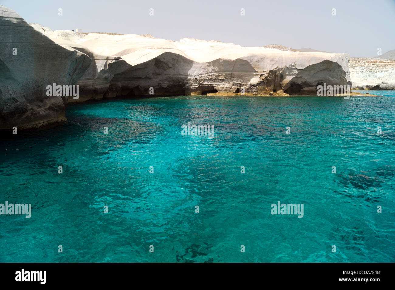 Caves and rock formations by the sea at Sarakiniko area on Milos island ...
