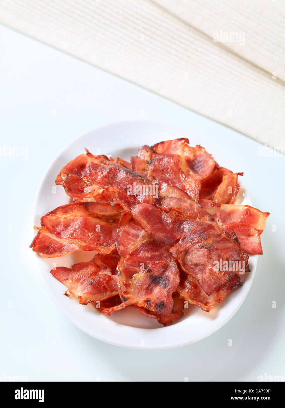 Crispy rashers of streaky bacon Stock Photo - Alamy