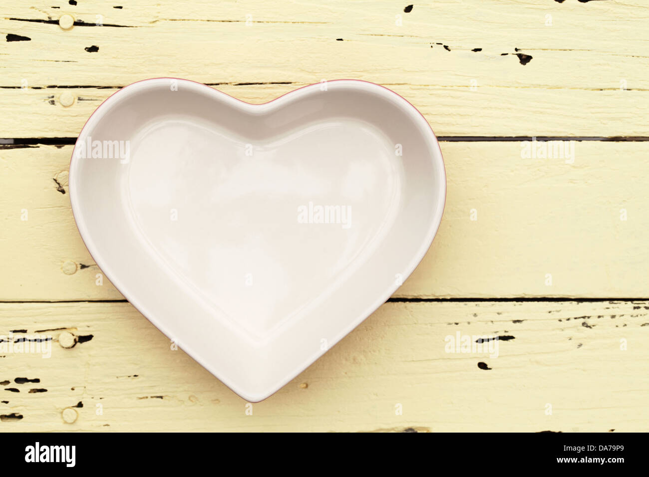 heart shape plate isolated on white background Stock Photo - Alamy