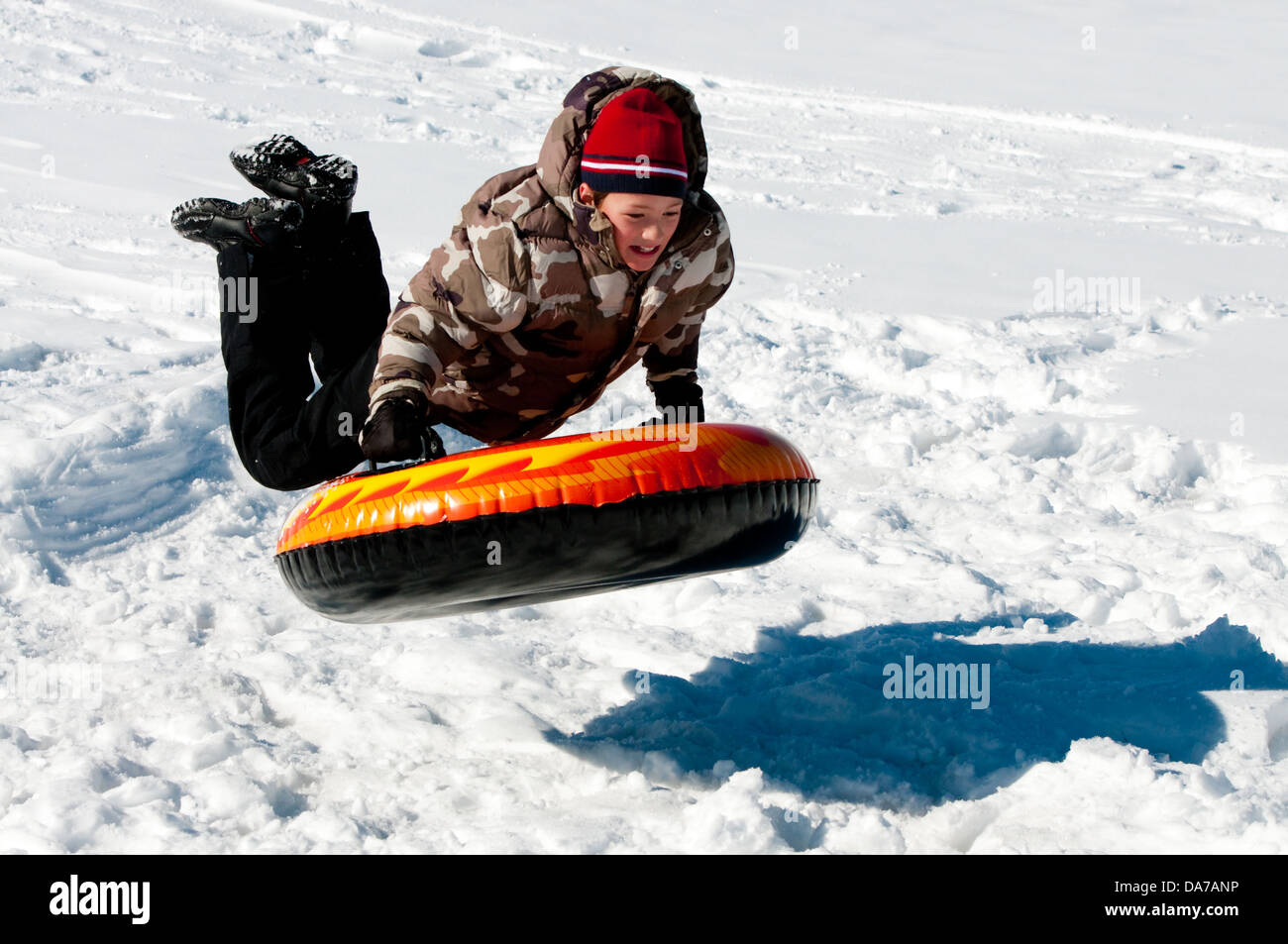Snow sled jump hi-res stock photography and images - Alamy