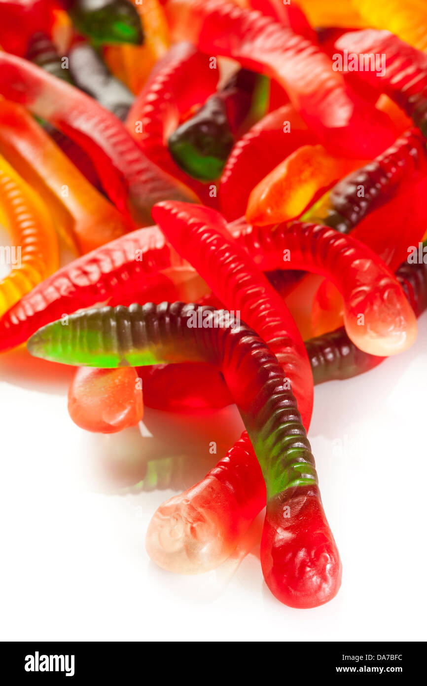 Colorful Fruity Gummy Worm Candy on a background Stock Photo - Alamy