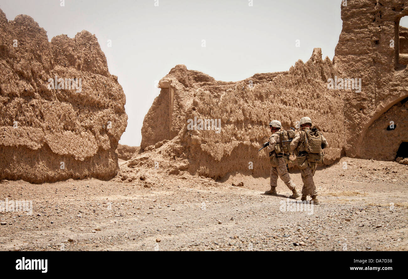 A US Marine clears the ruins of a 200-year old castle during Operation ...