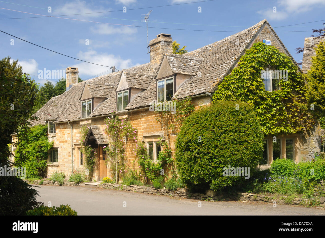 Traditional stone Cotswold cottage in Icomb, Gloucestershire, England ...