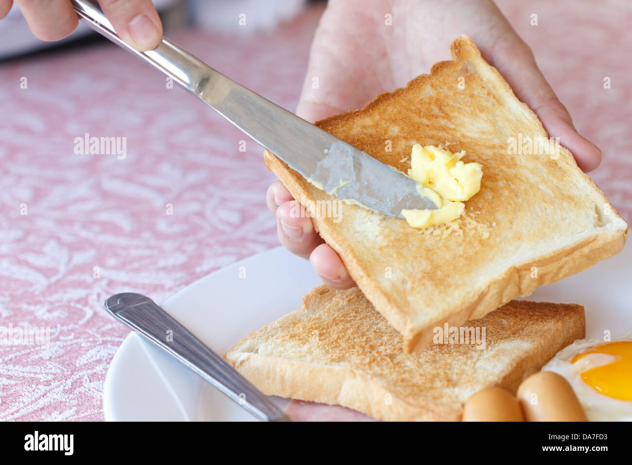 Buttered toast for breakfast to eat with coffee Stock Photo - Alamy
