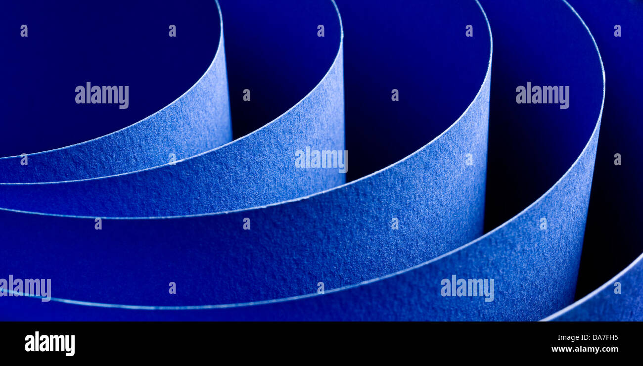 Abstract image of blue paper rolls Stock Photo - Alamy