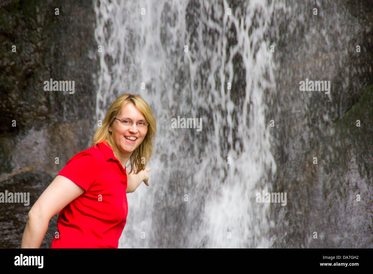 Person in front of the waterfall hi-res stock photography and images ...
